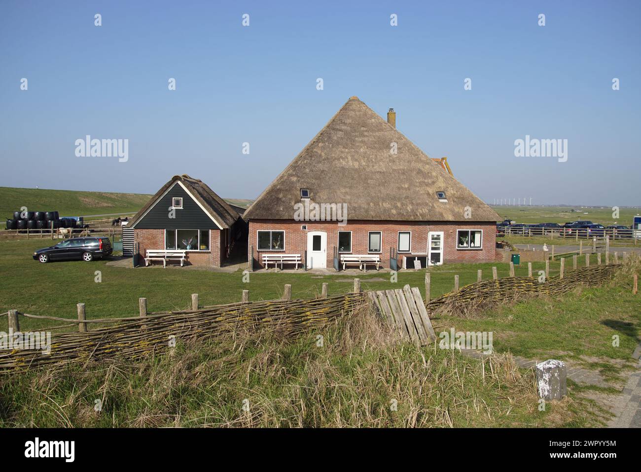 Camperduin farm with summer houses. Dutch dyke, seawall Hondsbossche ...