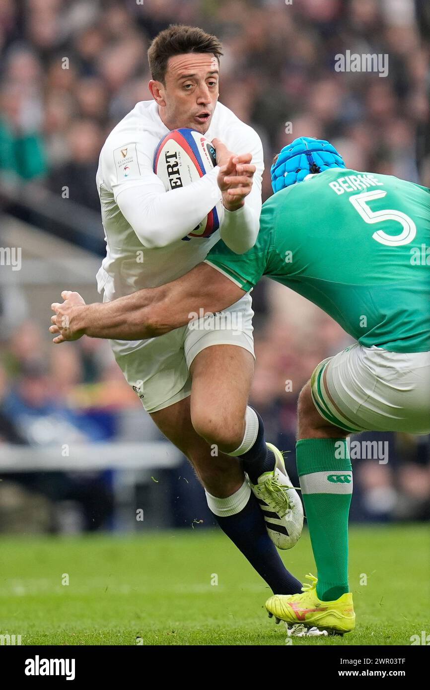 Alex Mitchell of England is tackled by Tadhg Beirne of Ireland during ...