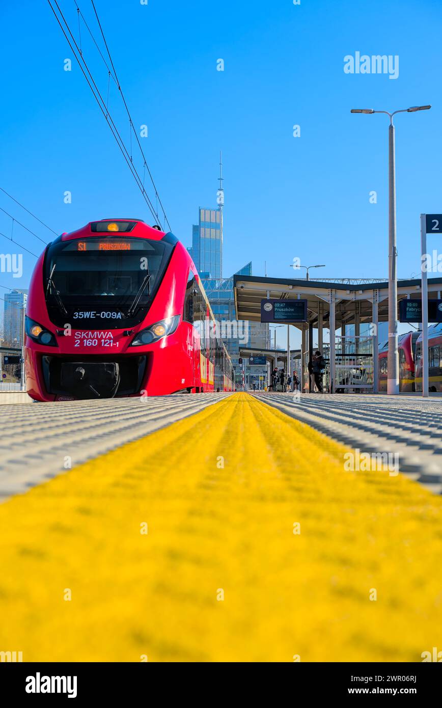 Warsaw Main Station, railway station and a train of the fast city ...