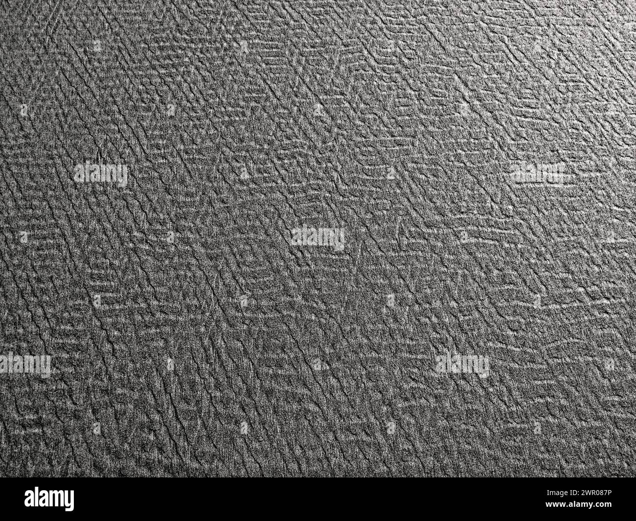 A textured surface is displayed, characterized by its detailed and ...