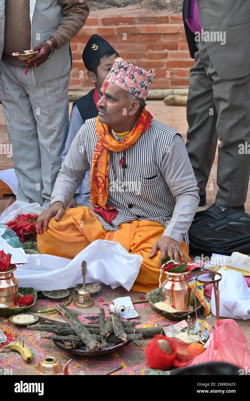 Nepalese master of ceremony celebrating a typical newari wedding in the ...
