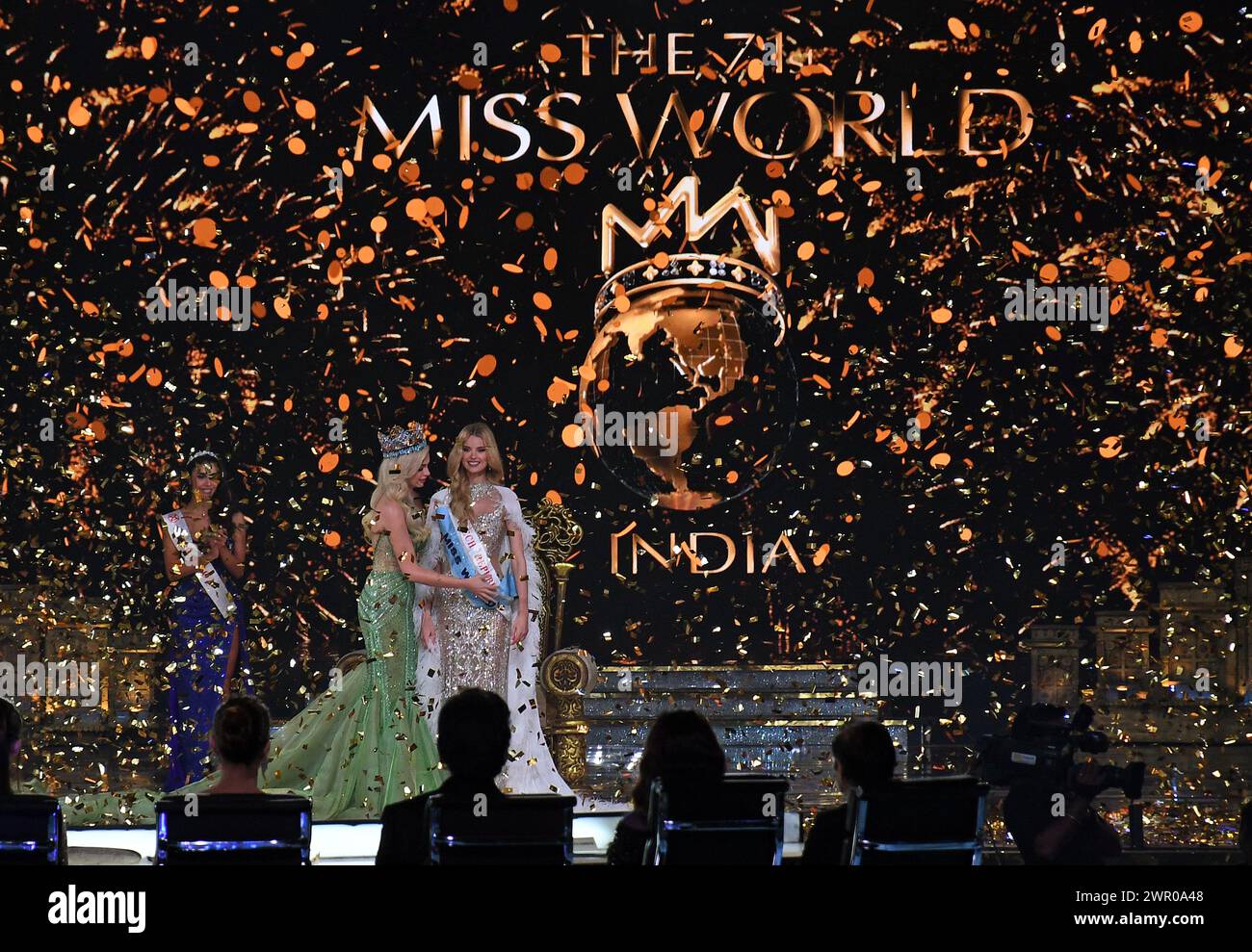 L-R Lebanon's Yasmina Zaytoun looks on as Poland's reigning Miss World ...