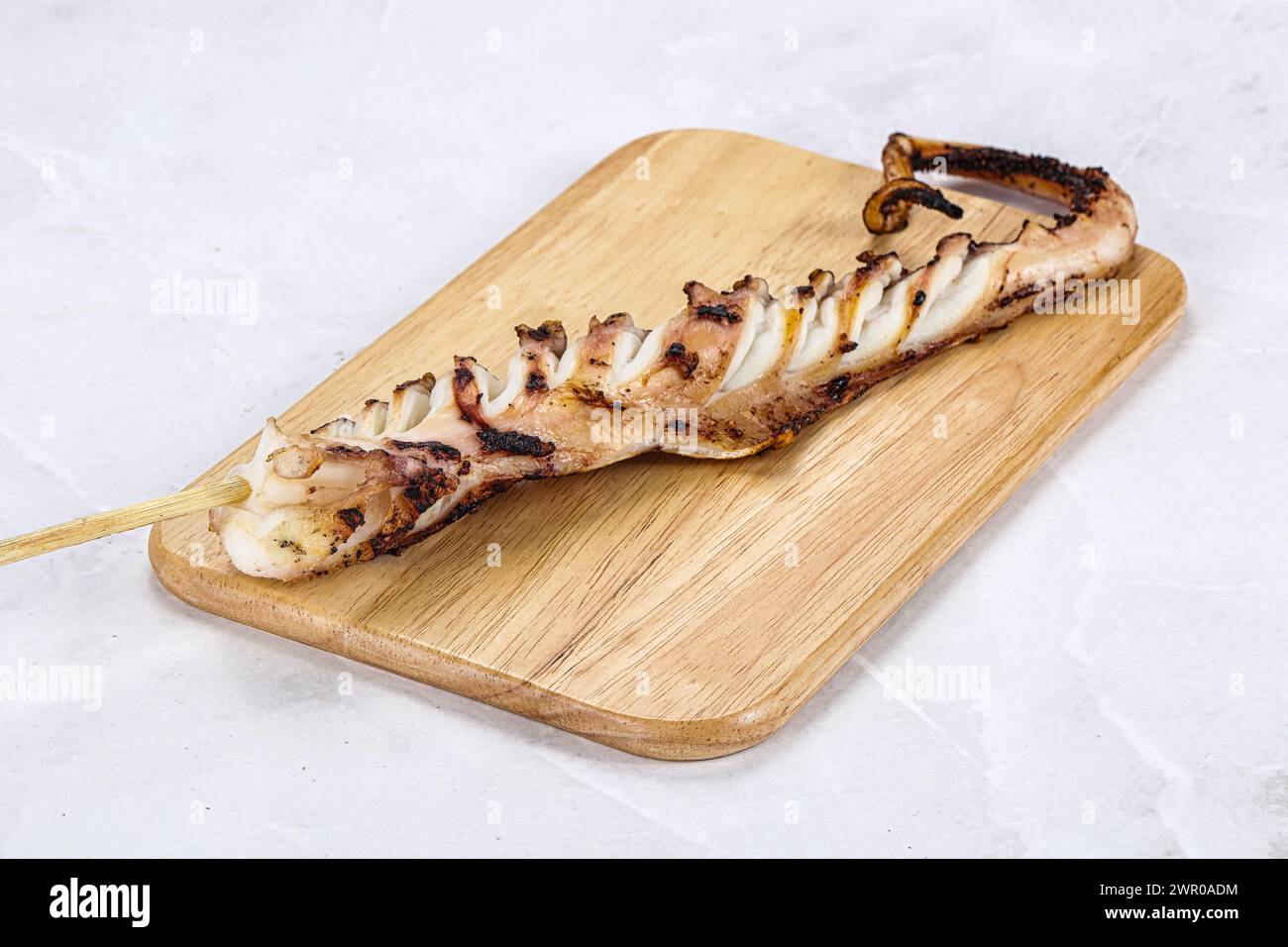 Delicous tasty Grilled octopus tentacle snack Stock Photo - Alamy