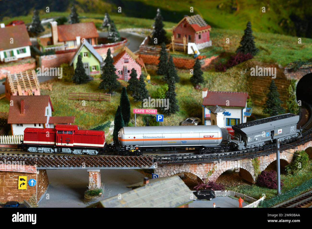 Miniature railway model with model freight train on a mountains ...