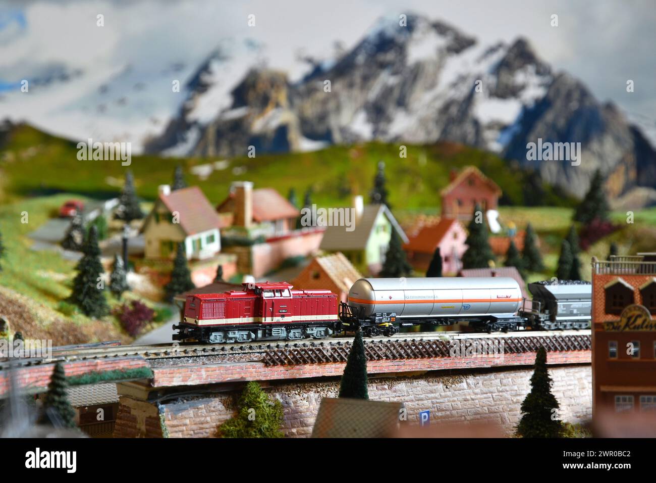 Miniature railway model with model freight train on a mountains ...