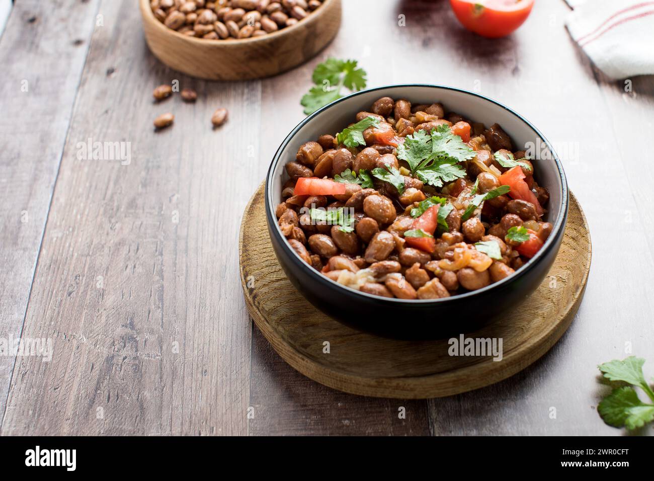 Vegetarian dish of stewed pink beans and tomatoes. A delicious bean ...