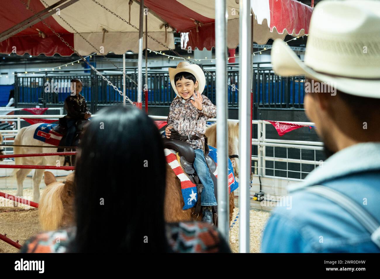 Houston, USA. 9th Mar, 2024. A boy rides a horse during the 92nd ...