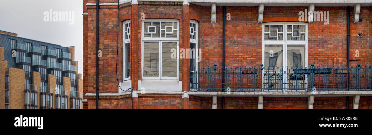balcony with classic white windows from typical London architecture ...