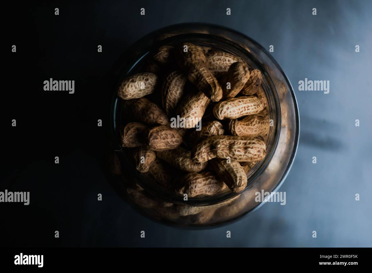 peanuts in a mason jar, top view Stock Photo - Alamy