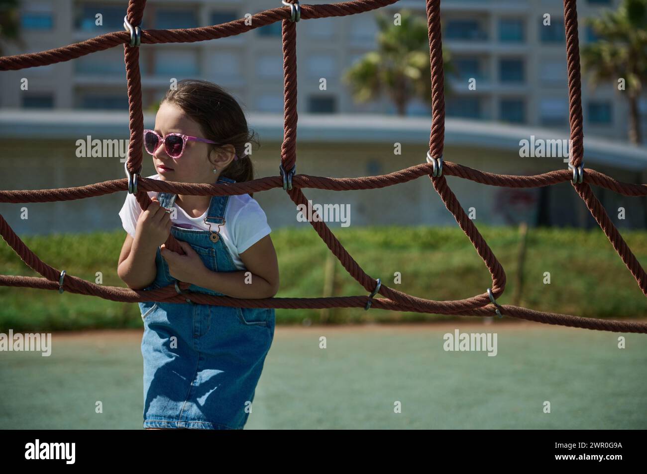 Adorable preschooler girl having fun in adventure park. Caucasian cute ...