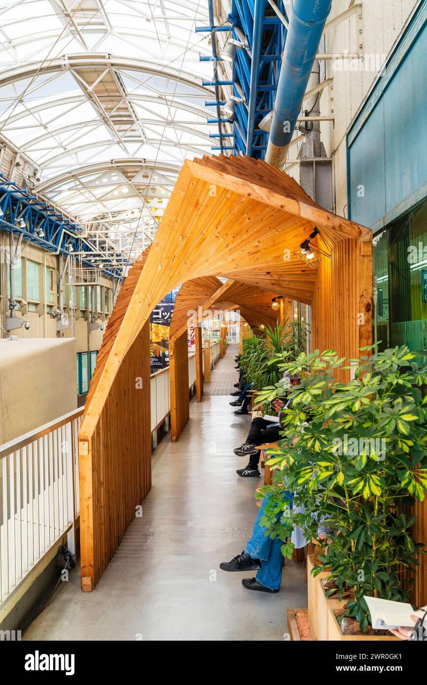 Free to use wooden seat cubicles outside a bookshop on the second level ...