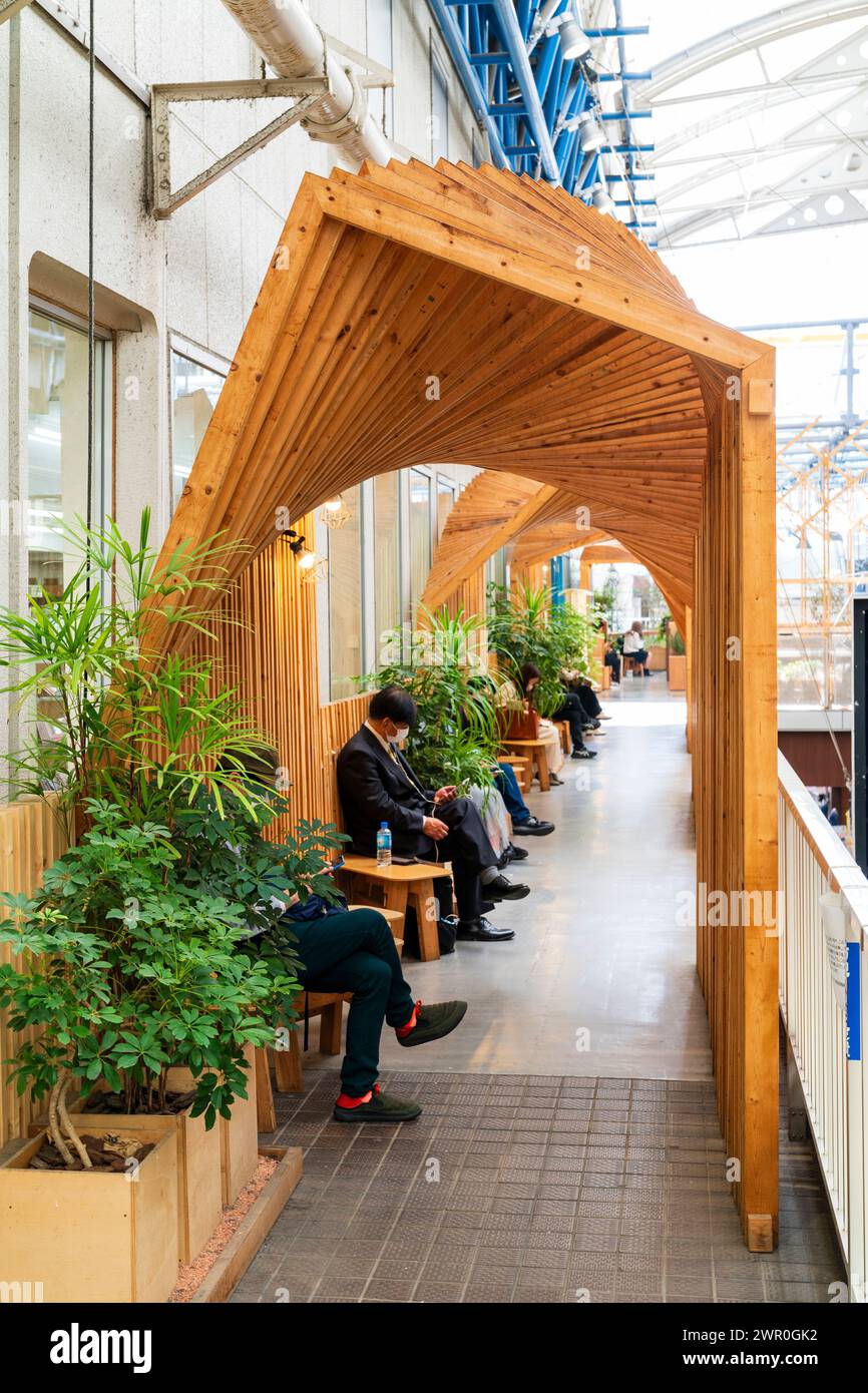 Free to use wooden seat cubicles outside a bookshop on the second level ...