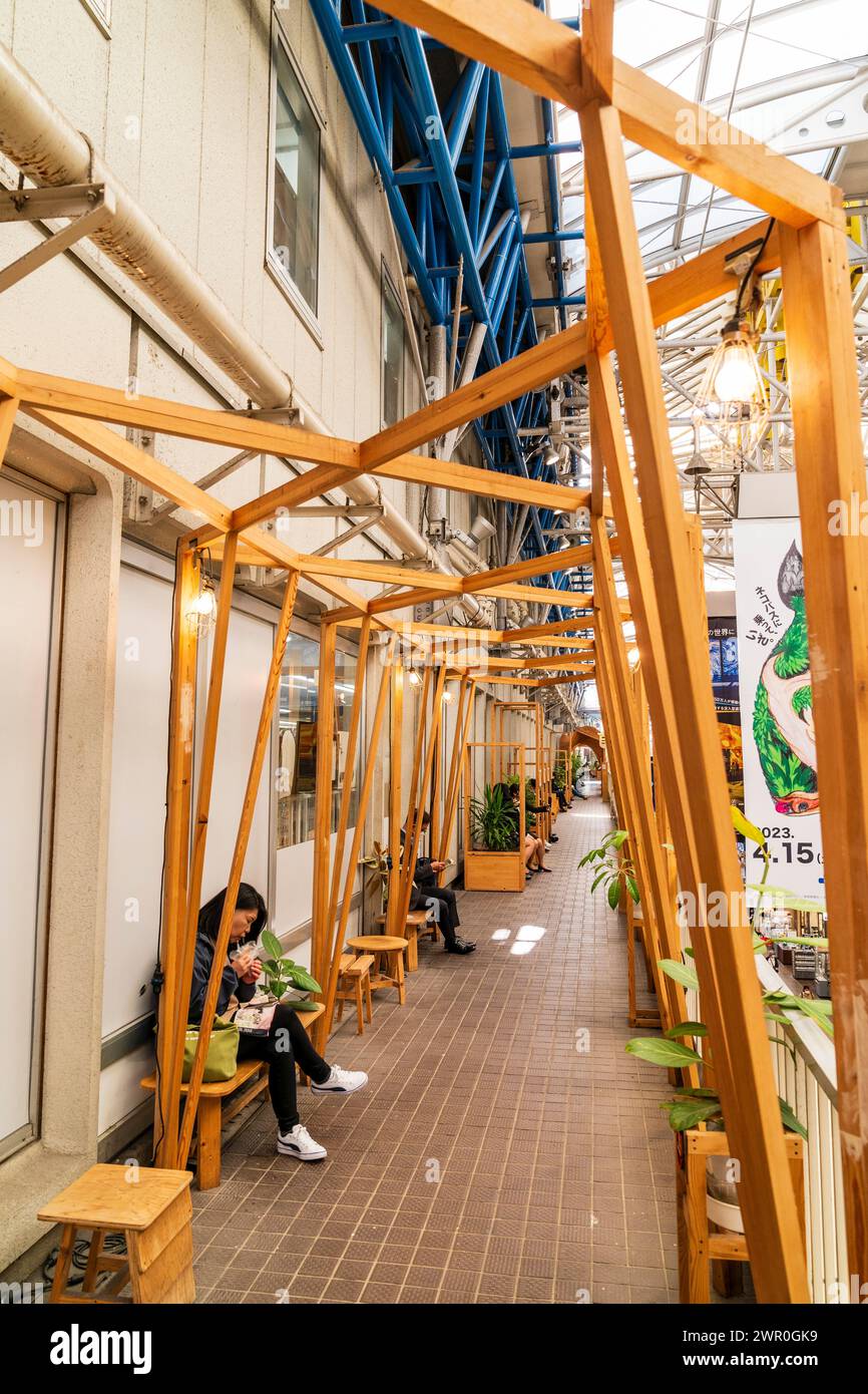 Free to use wooden seat cubicles outside a bookshop on the second level ...
