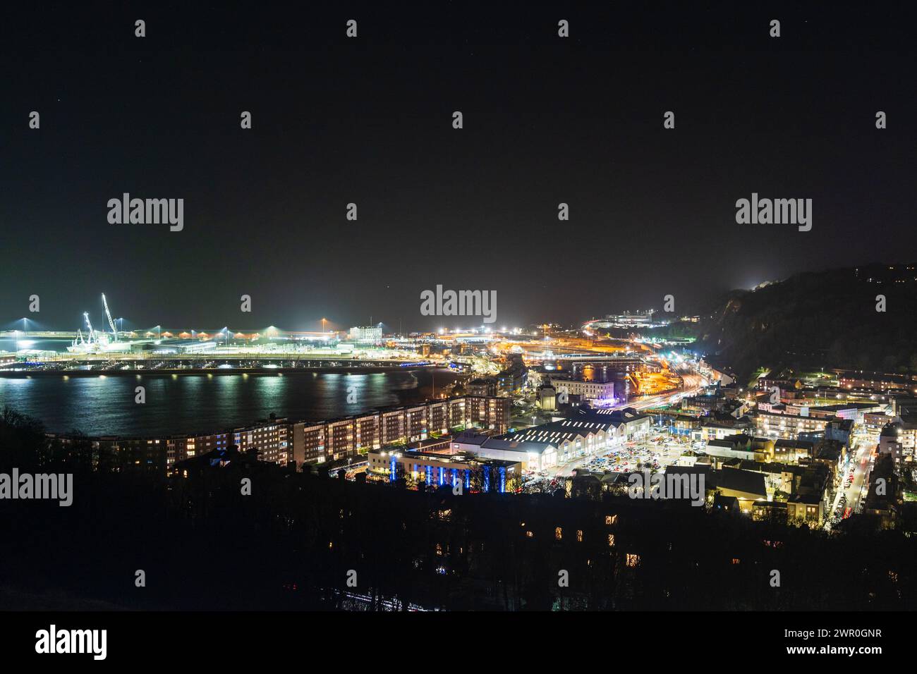 Dover city, beach and port at night from a high viewpoint at Dover ...