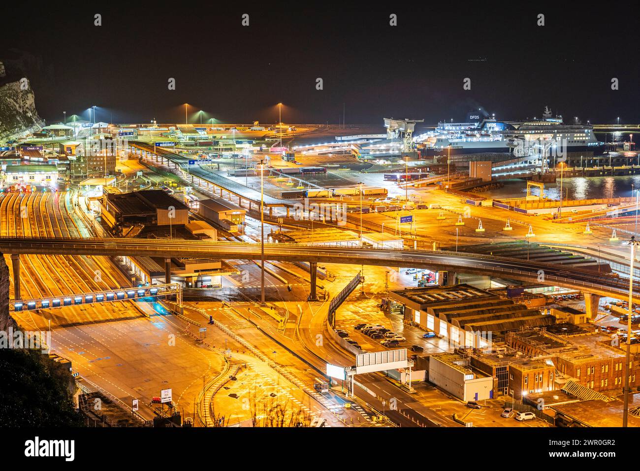 Cliff top view looking down at the busy car ferry terminal complex at ...
