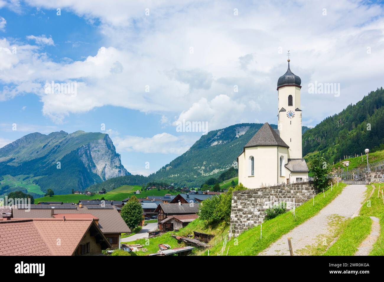 Schoppernau: church Schoppernau, mountain Kanisfluh in Bregenzerwald ...
