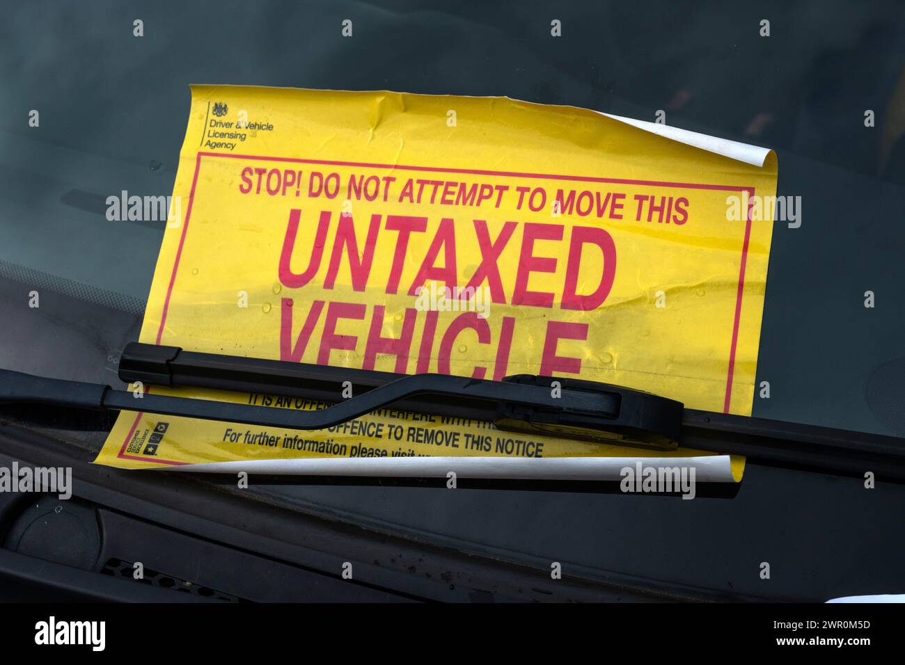 Untaxed car is clamped on hi-res stock photography and images - Alamy