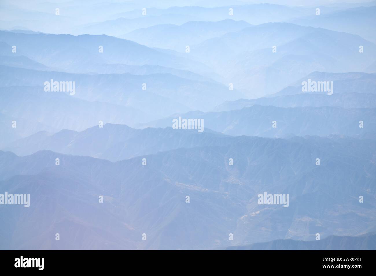 landscape of mountain with mist from window plane Stock Photo - Alamy