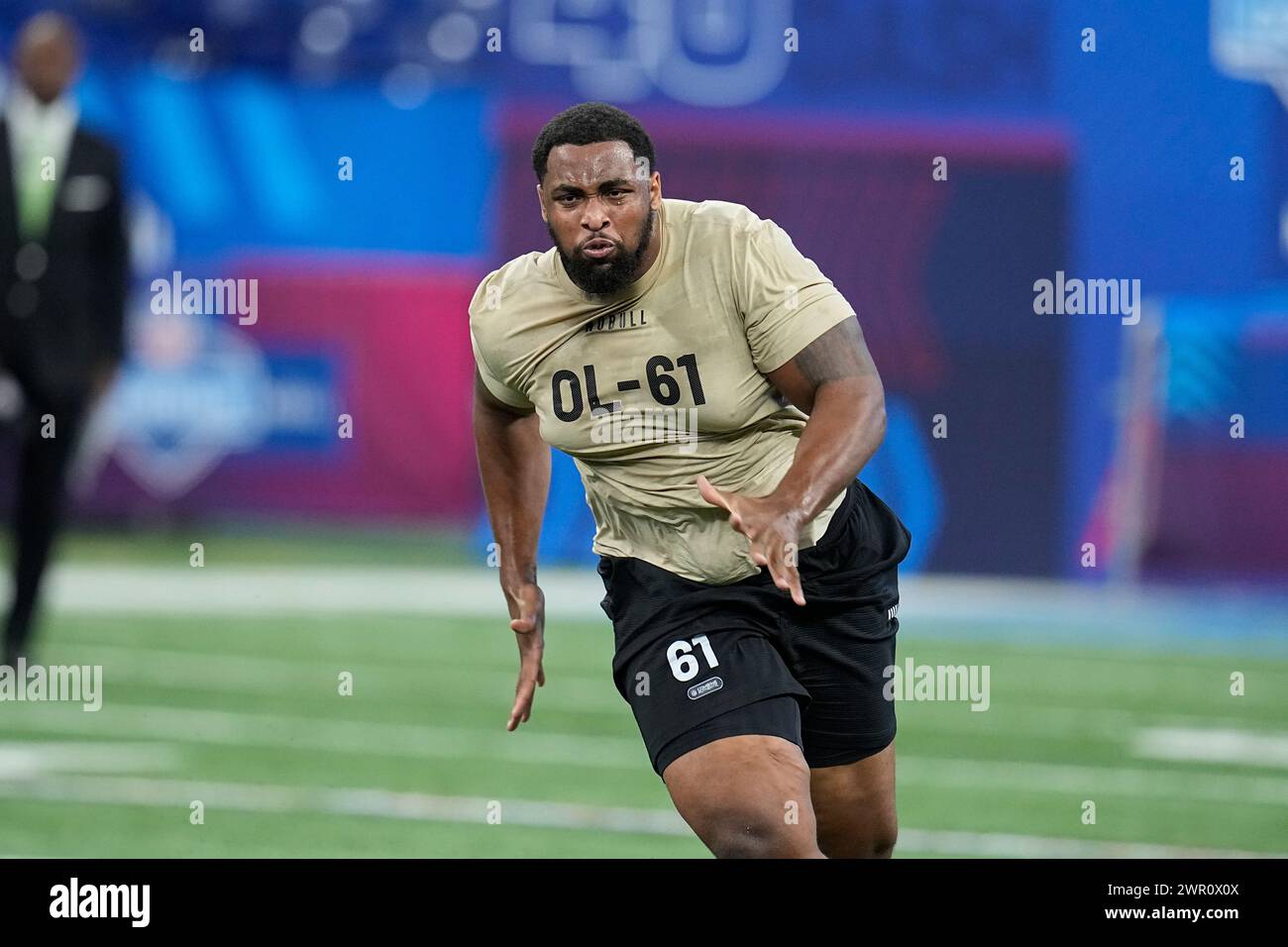 Texas A&M offensive lineman Layden Robinson runs a drill at the NFL ...