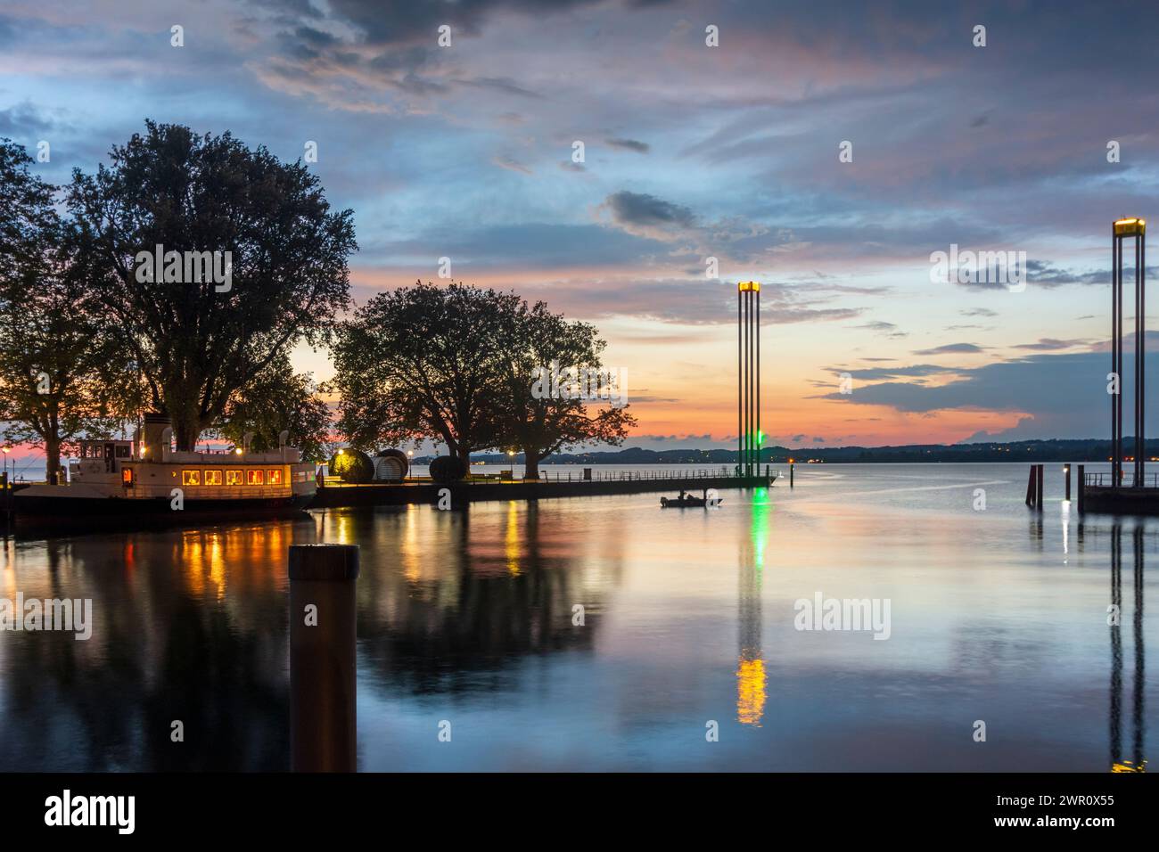 Bregenz: lake Bodensee (Lake Constance), harbor, boat, sunset ...