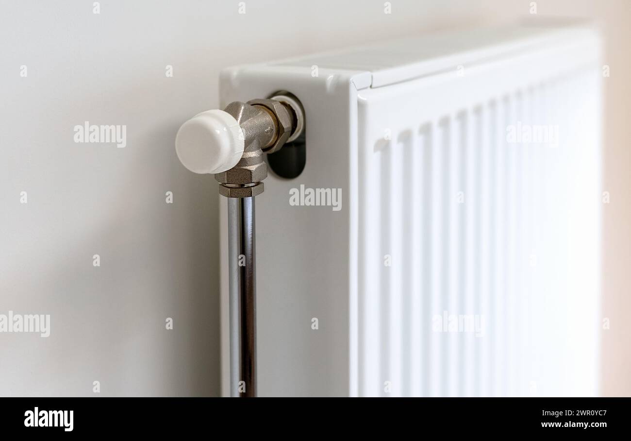 Domestic heating radiator. Central heating system Stock Photo - Alamy