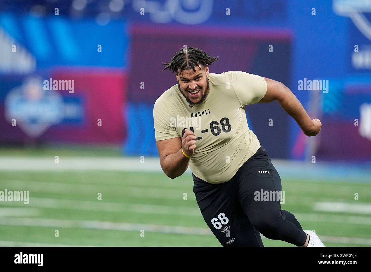 LSU offensive lineman Charles Turner runs a drill at the NFL football ...