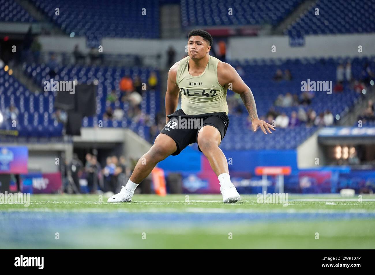 Utah offensive lineman Sataoa Laumea runs a drill at the NFL football ...