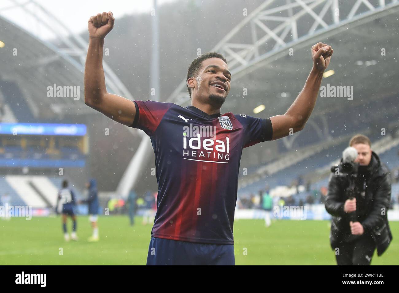 Grady Diangana of West Bromwich Albion celebrates a win in front of the ...
