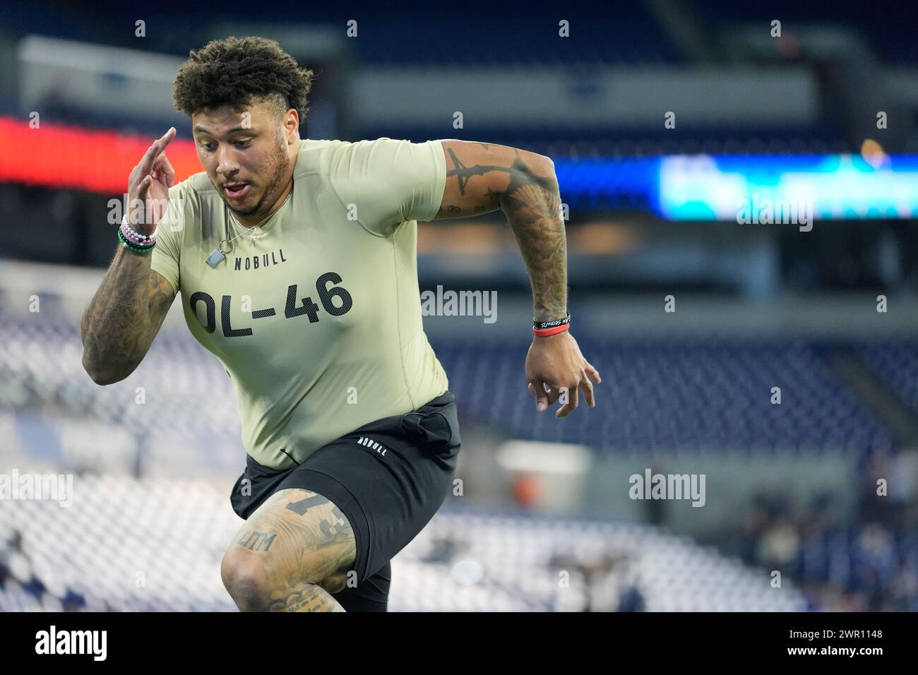 Boston College offensive lineman Christian Mahogany runs a drill at the ...