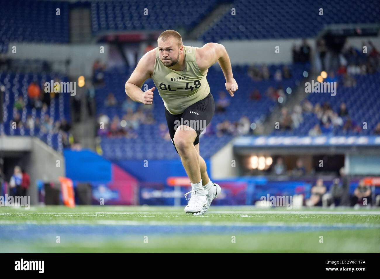 South Dakota State offensive lineman Mason McCormick runs a drill at ...