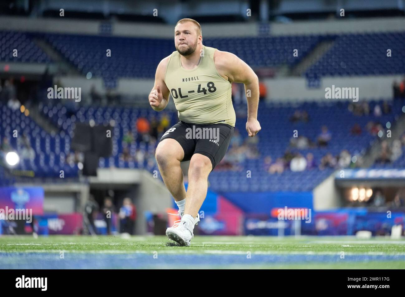 South Dakota State offensive lineman Mason McCormick runs a drill at ...