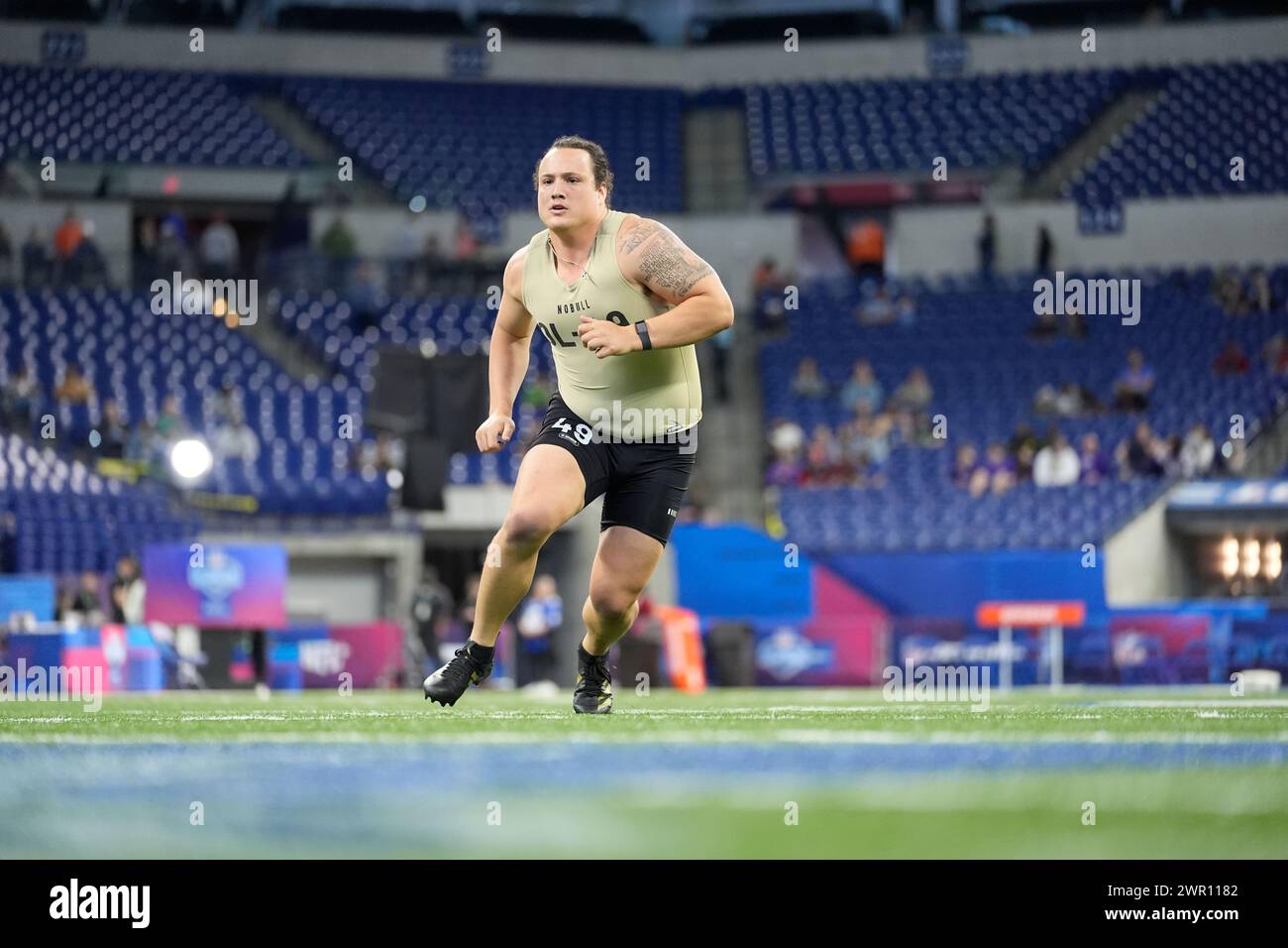 North Carolina State offensive lineman Dylan McMahon runs a drill at ...