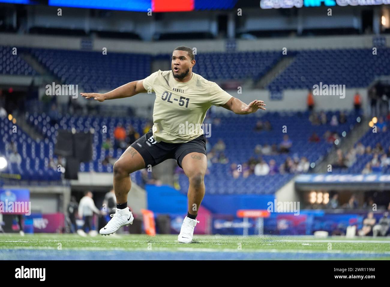 Duke offensive lineman Jacob Monk runs a drill at the NFL football ...