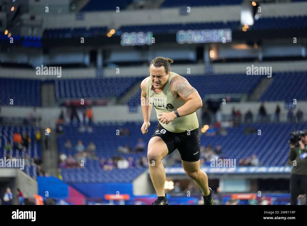 North Carolina State offensive lineman Dylan McMahon runs a drill at ...