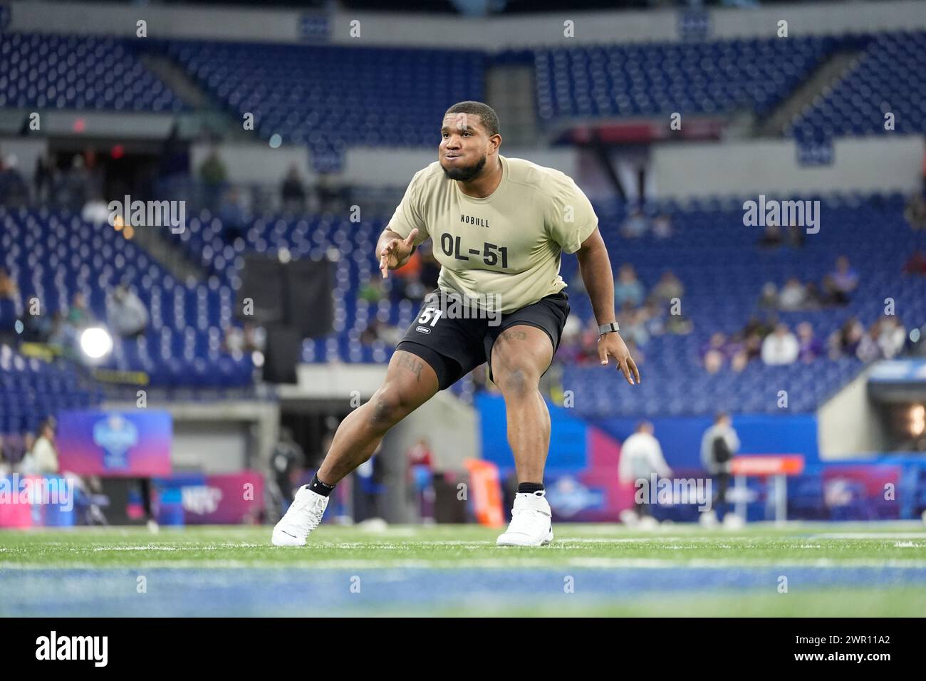 Duke offensive lineman Jacob Monk runs a drill at the NFL football ...