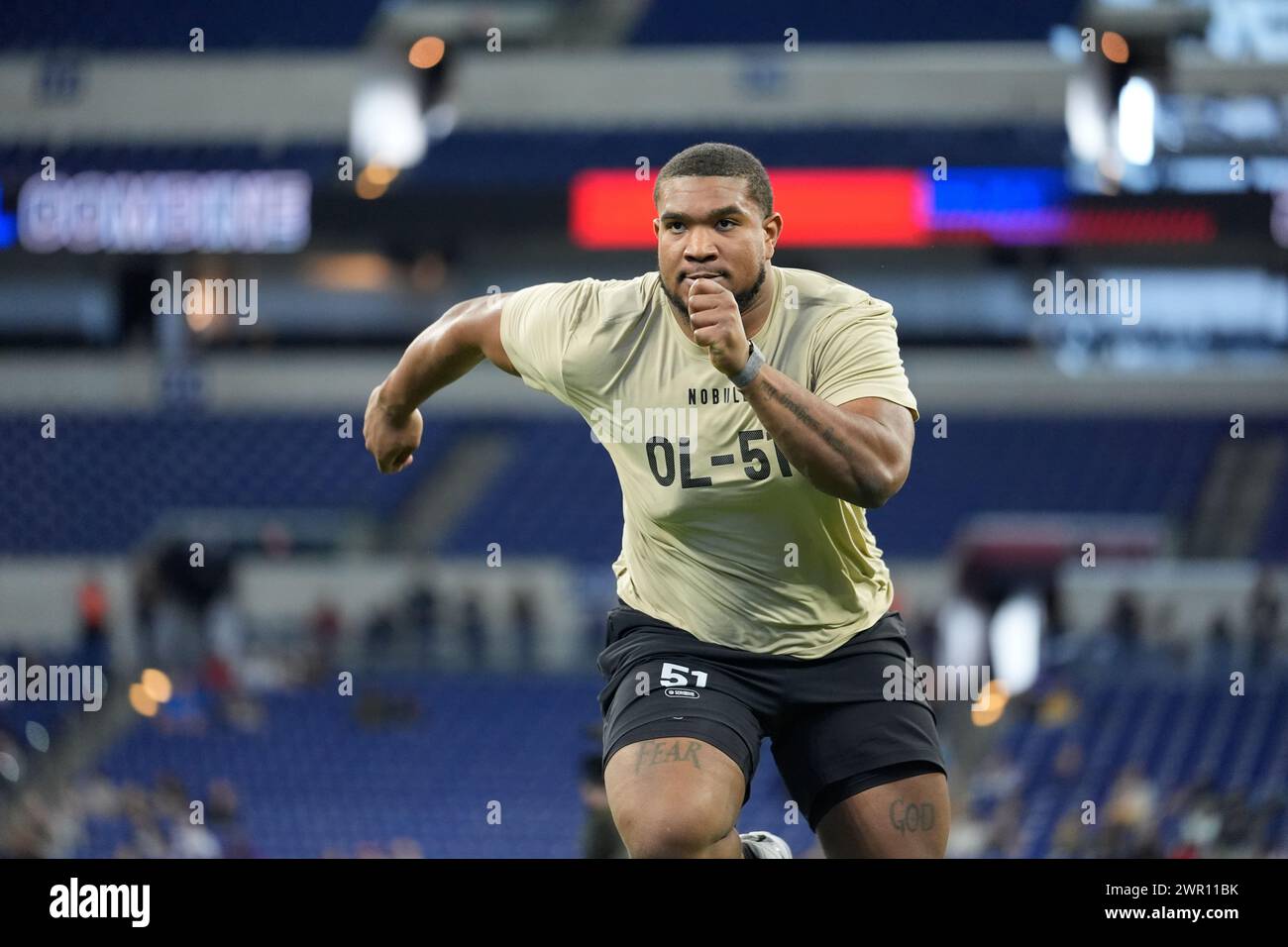 Duke offensive lineman Jacob Monk runs a drill at the NFL football ...