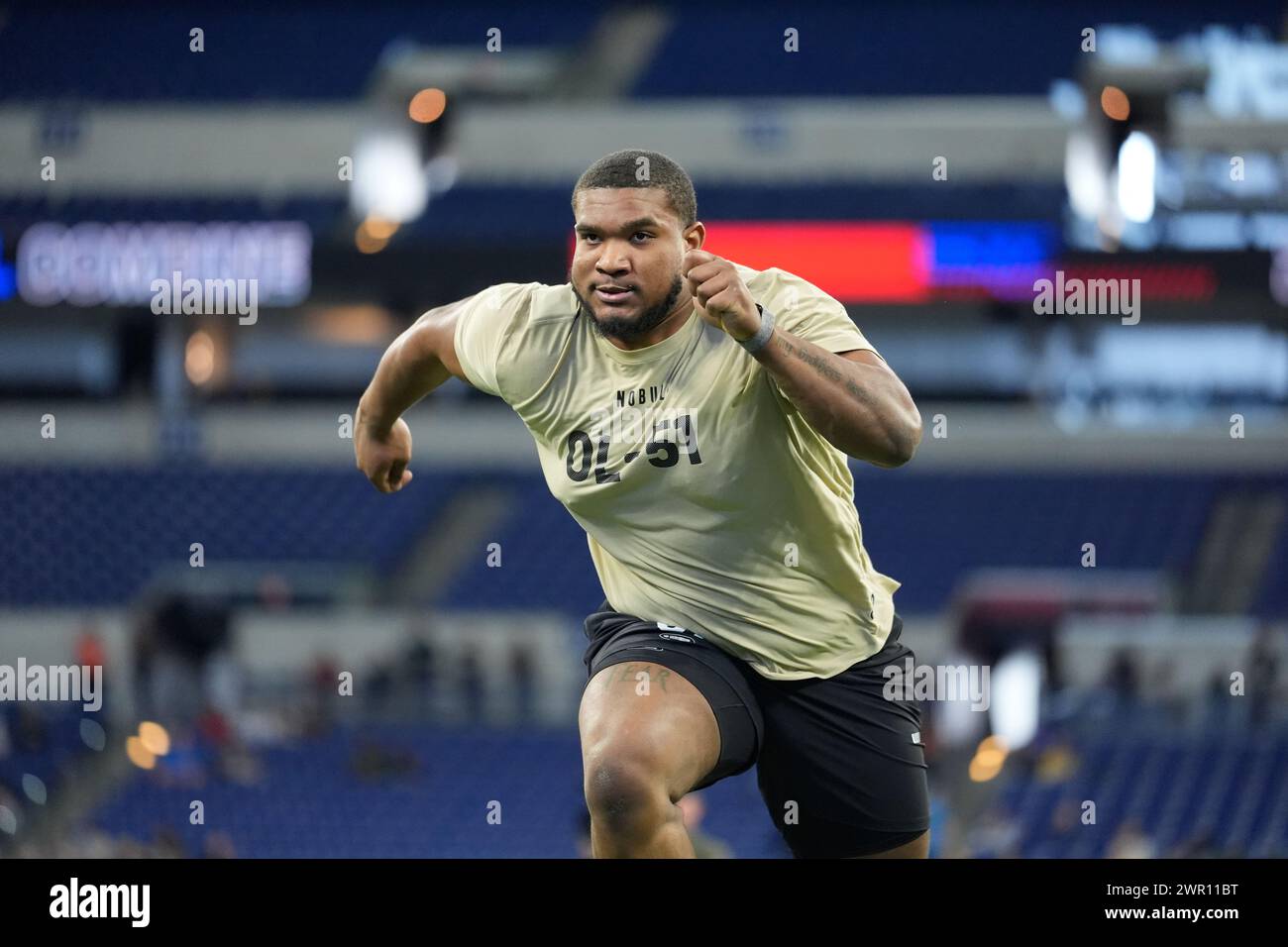 Duke offensive lineman Jacob Monk runs a drill at the NFL football ...
