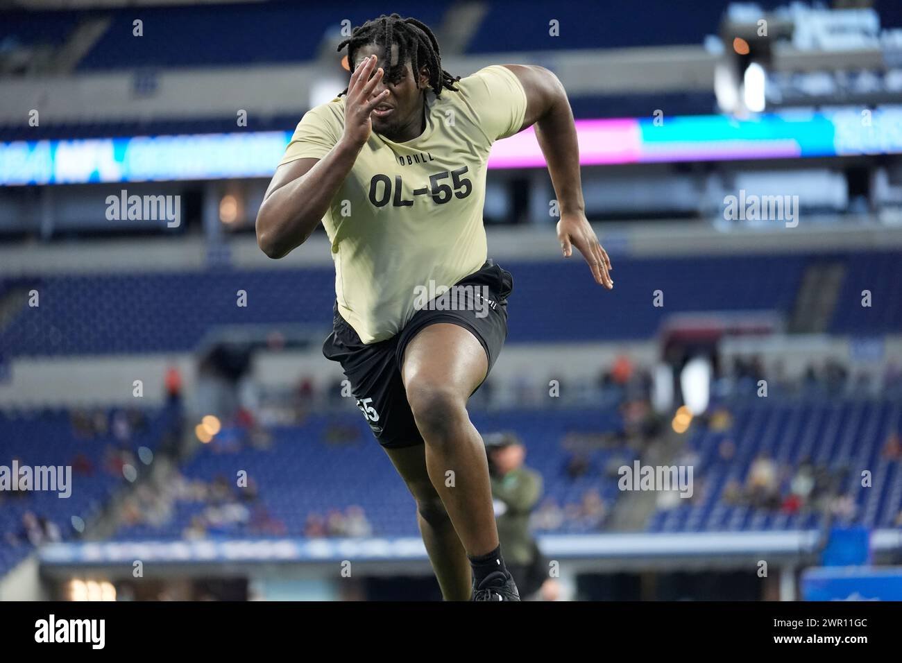 Houston offensive lineman Patrick Paul runs a drill at the NFL football ...
