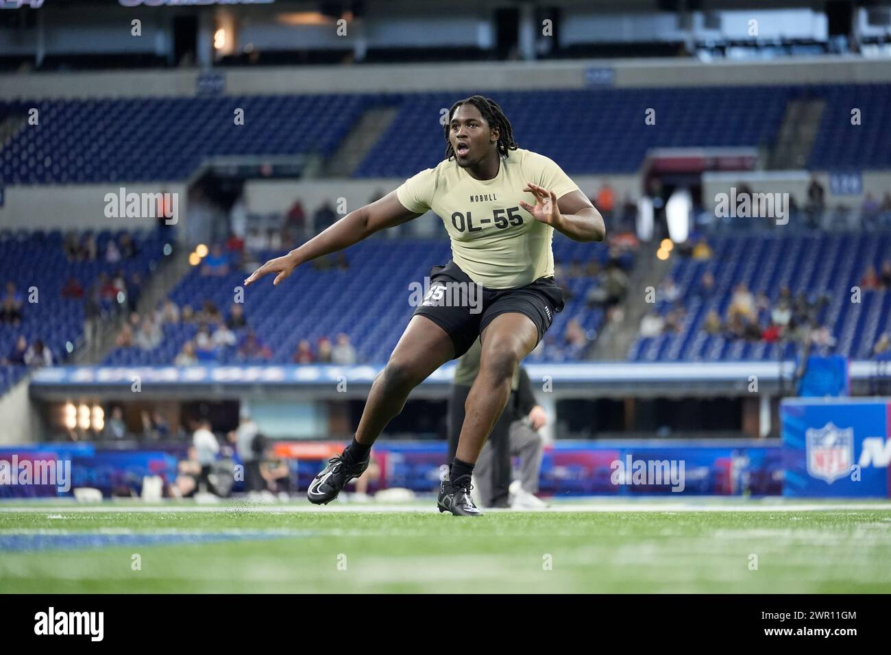 Houston offensive lineman Patrick Paul runs a drill at the NFL football ...