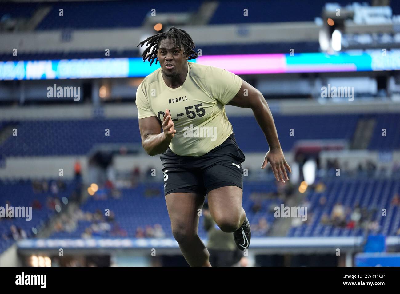 Houston offensive lineman Patrick Paul runs a drill at the NFL football ...