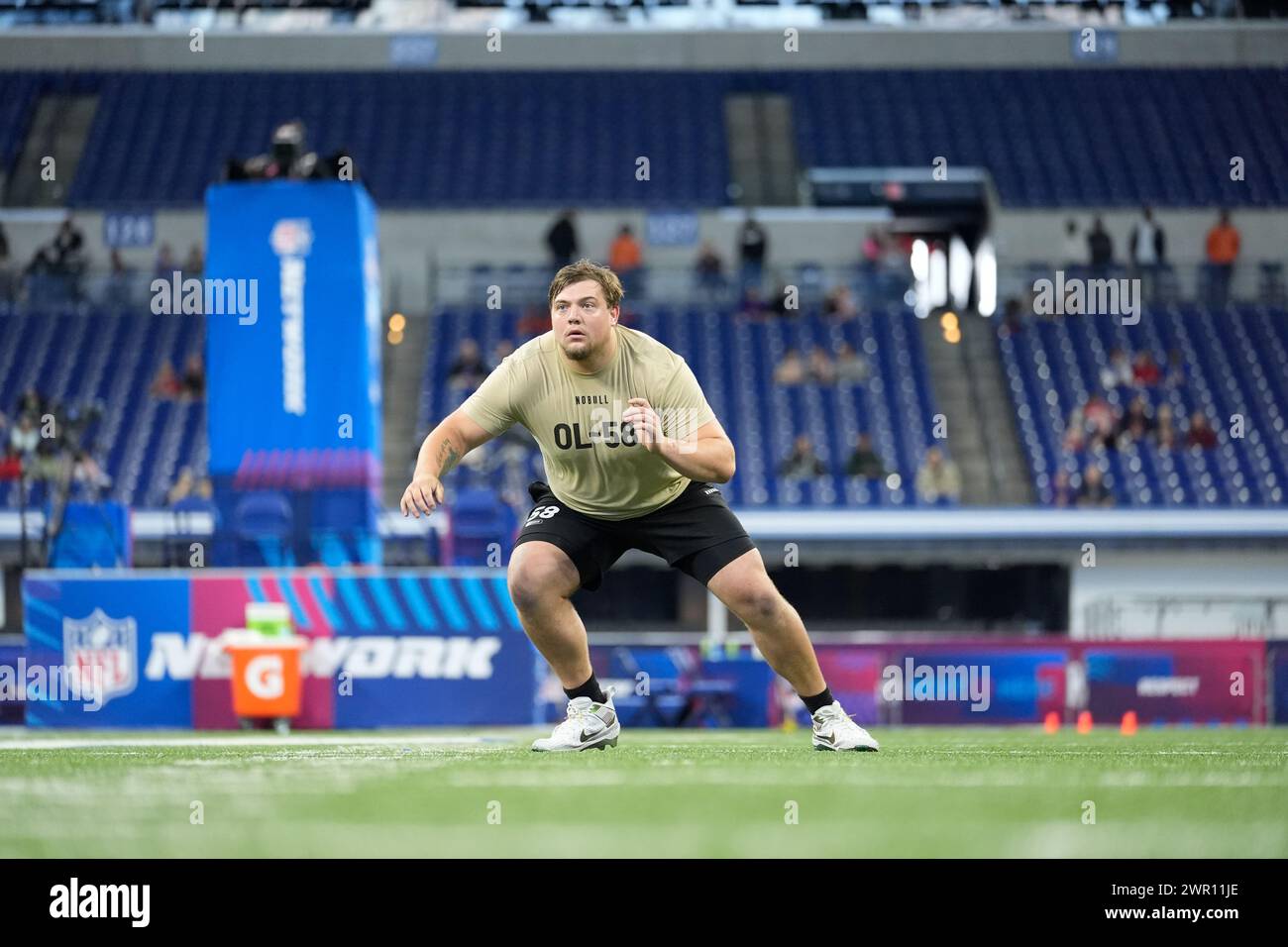 Oregon offensive lineman Jackson Powers-Johnson runs a drill at the NFL ...