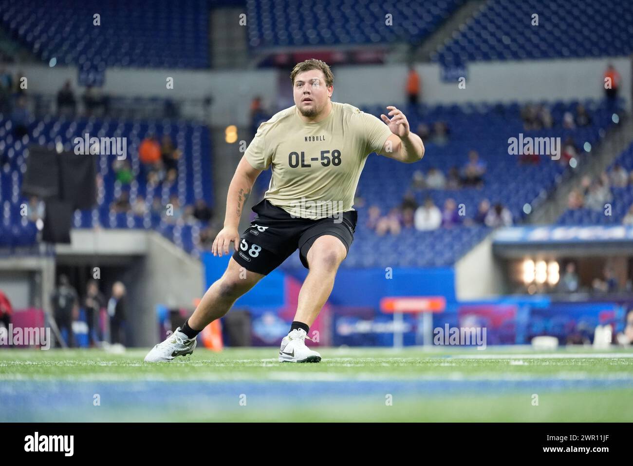 Oregon offensive lineman Jackson Powers-Johnson runs a drill at the NFL ...