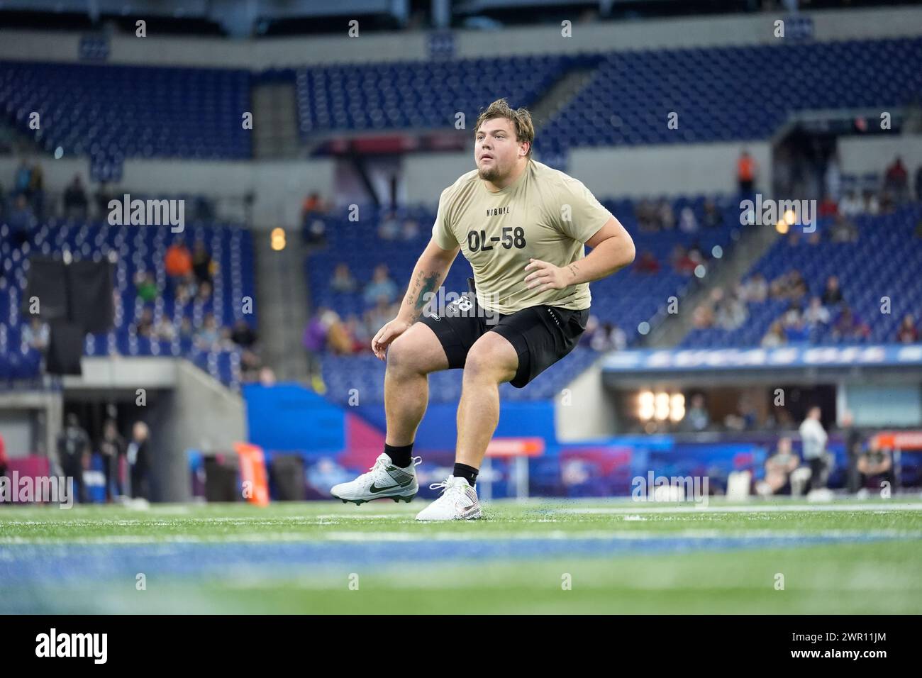 Oregon offensive lineman Jackson Powers-Johnson runs a drill at the NFL ...