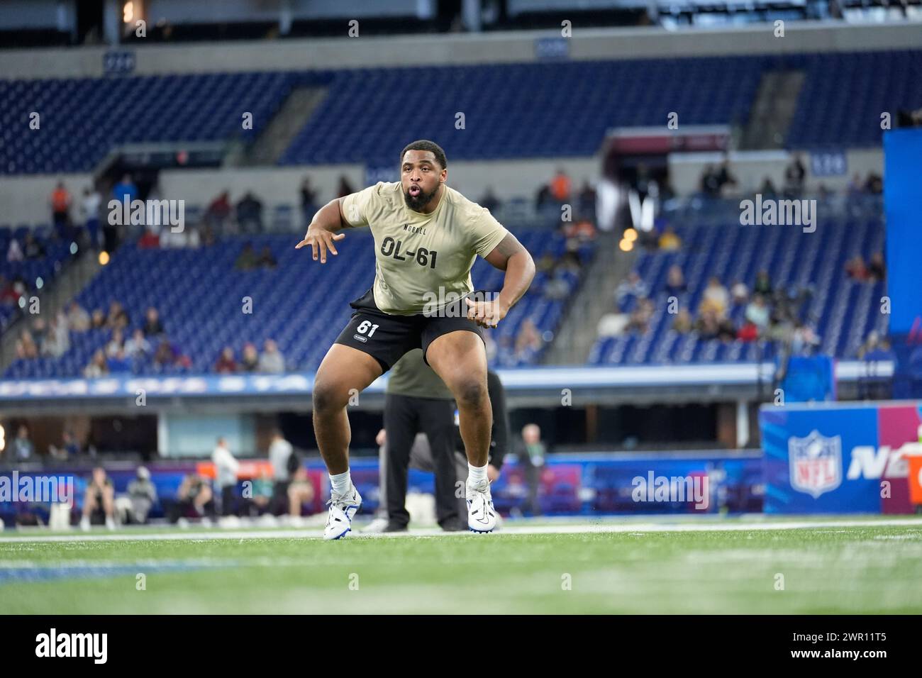 Texas A&M offensive lineman Layden Robinson runs a drill at the NFL ...