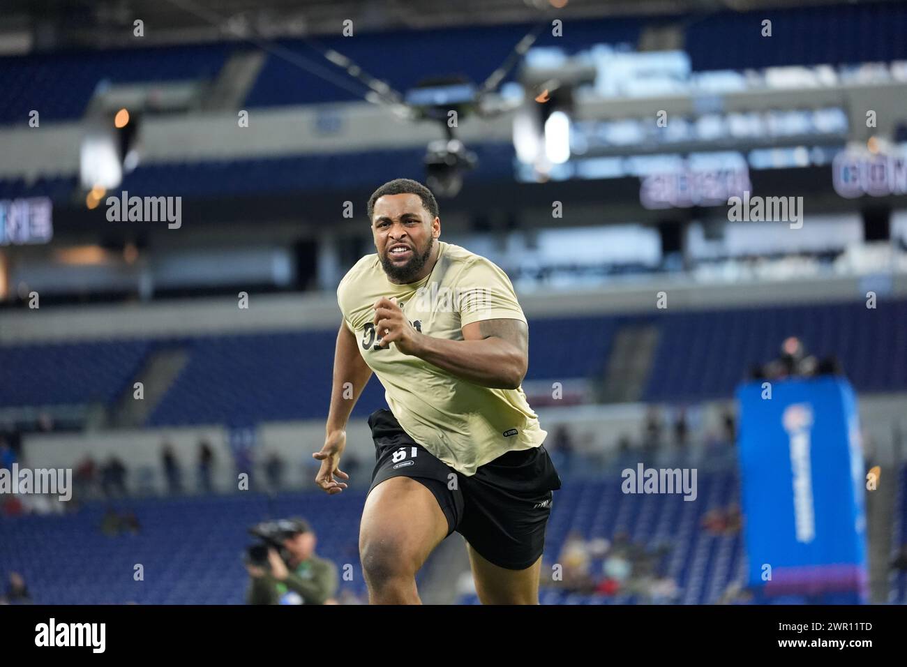 Texas A&M offensive lineman Layden Robinson runs a drill at the NFL ...