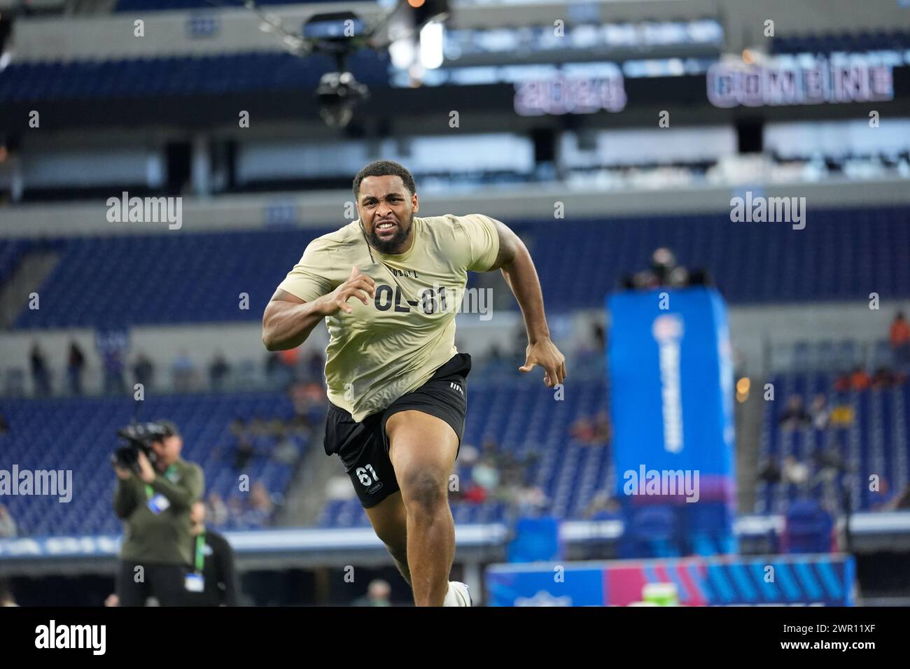Texas A&M offensive lineman Layden Robinson runs a drill at the NFL ...