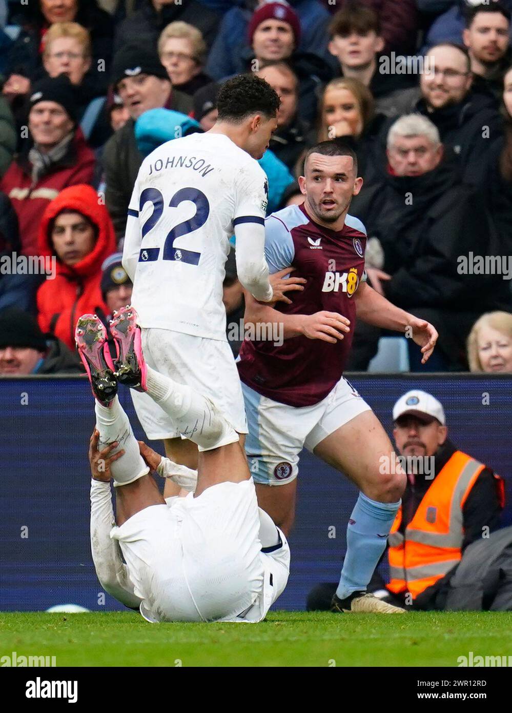 Aston Villa's John McGinn (right) is confronted by Tottenham Hotspur ...