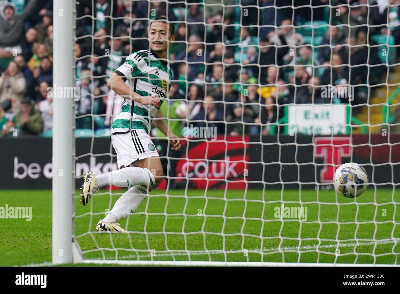 Celtic’s Daizen Maeda celebrates scoring the opening goal of the game ...