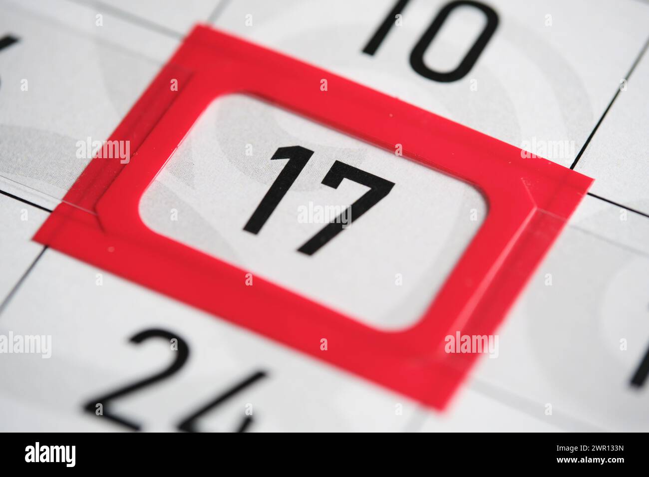 Calendar date. The 17th number the calendar is highlighted in a red ...