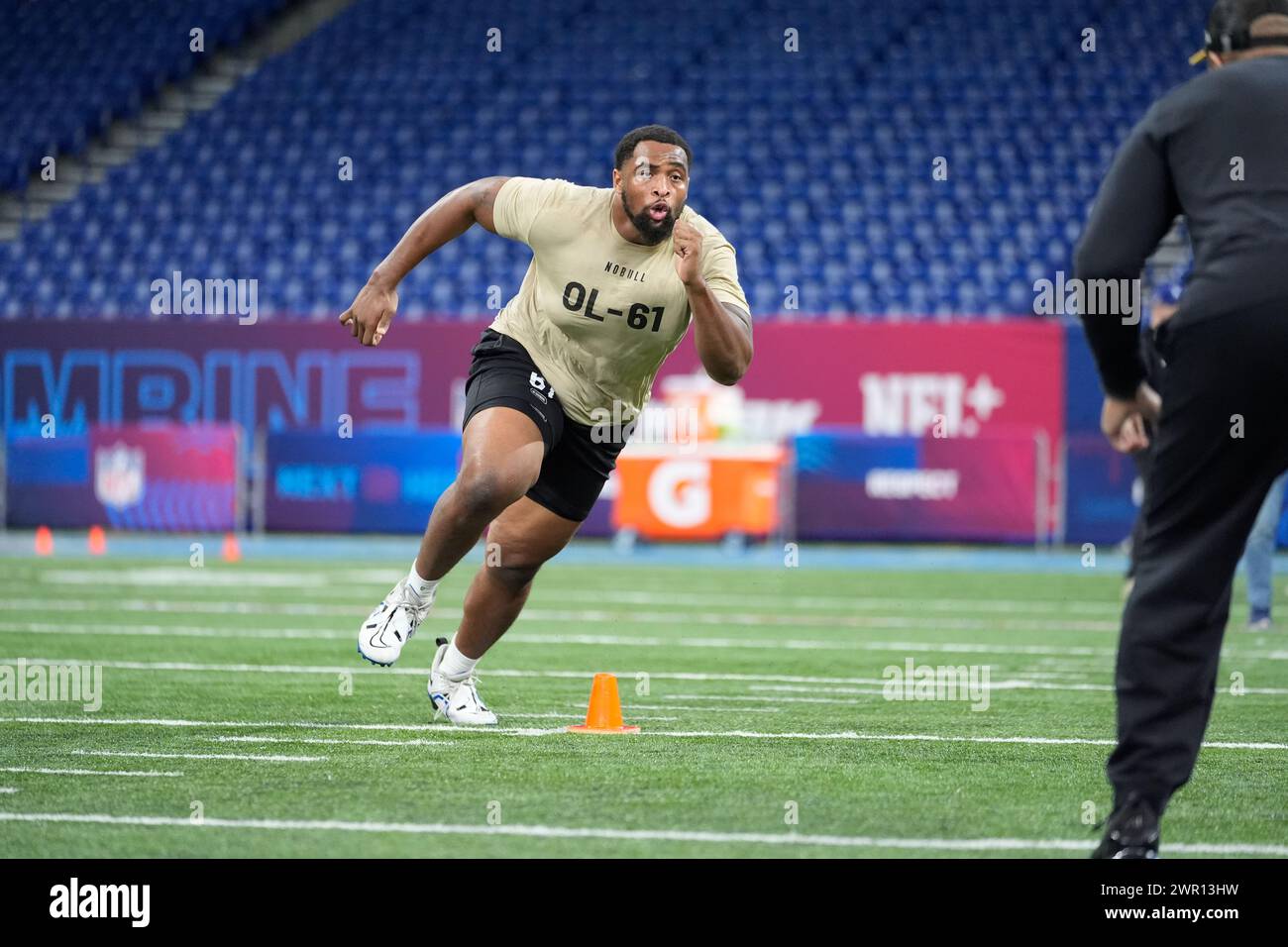 Texas A&M offensive lineman Layden Robinson runs a drill at the NFL ...